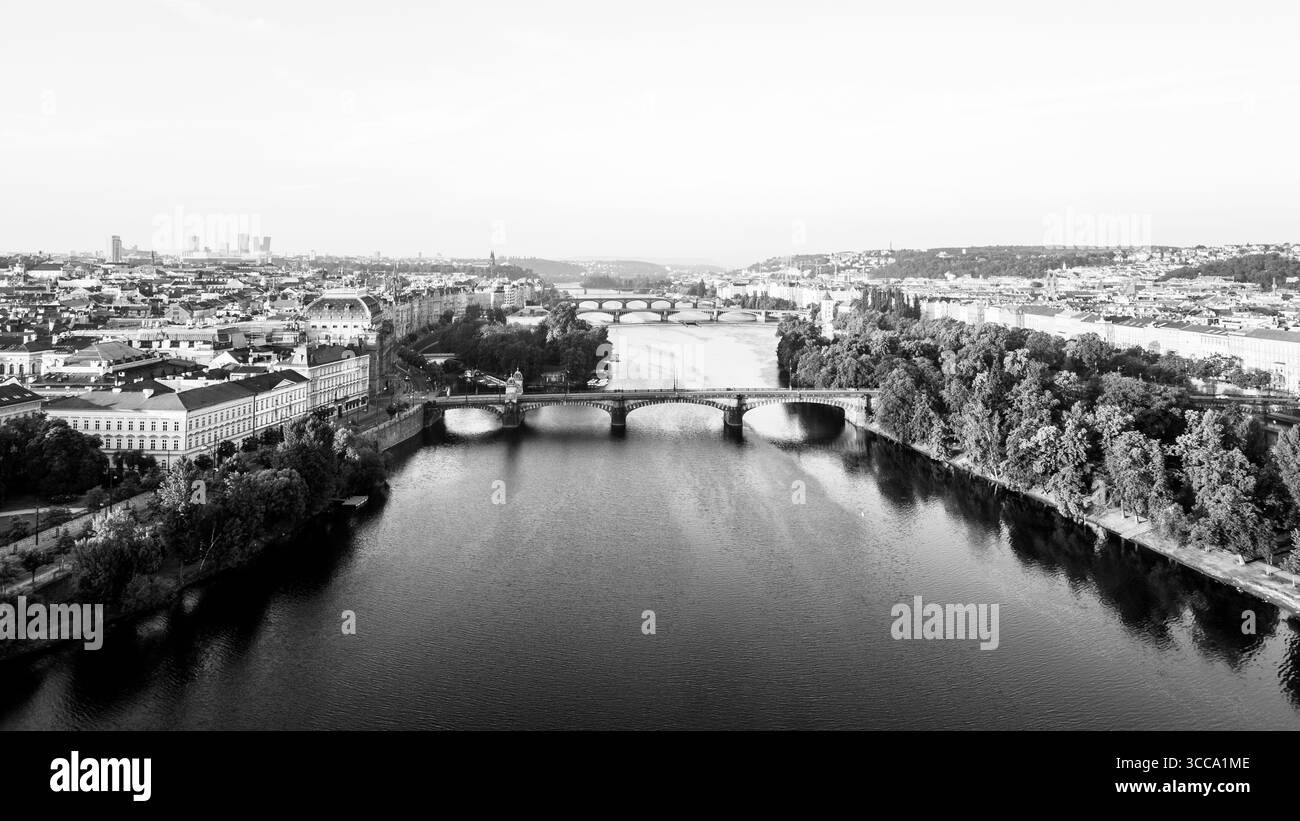 Aerial view of the Vltava River winding through Prague, showcasing the ...