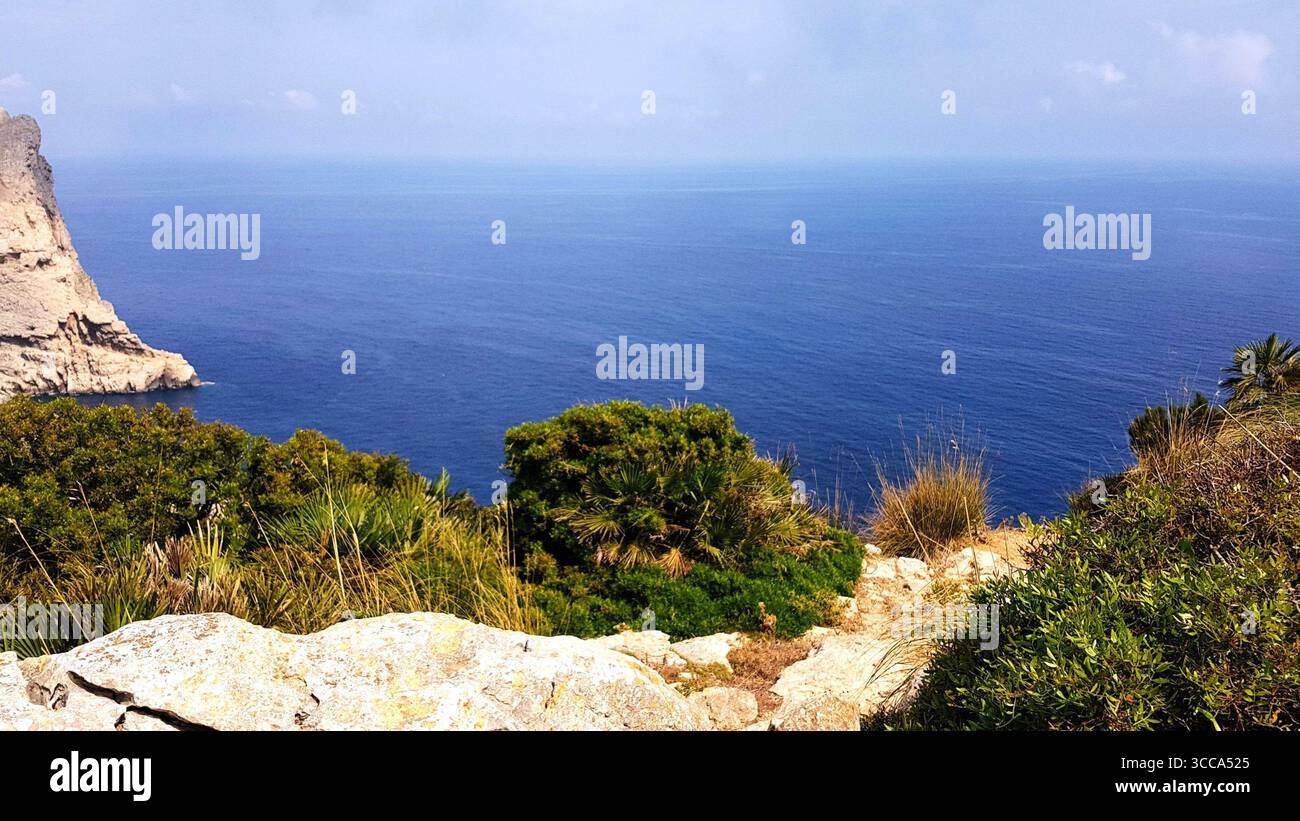 View from a steep cliff onto the deep blue Mediterranean Sea on the ...