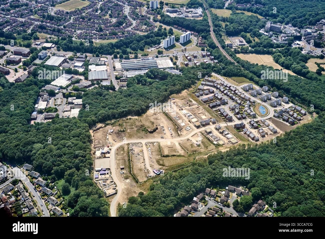 An aerial view of new housing being constructed in an old Quarry, at ...