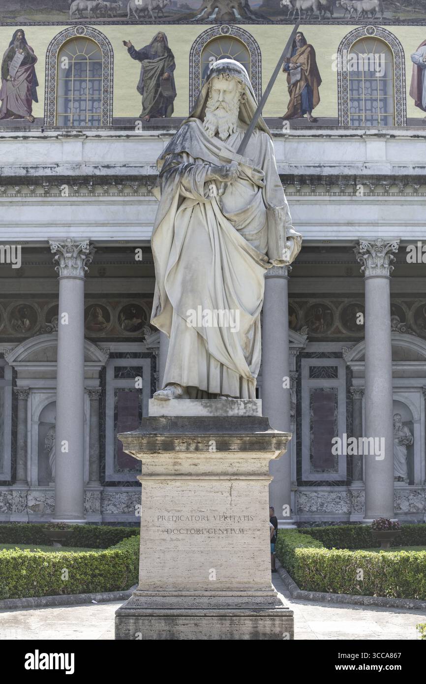 Marble statue of Saint Paul holding a sword, located in the courtyard ...