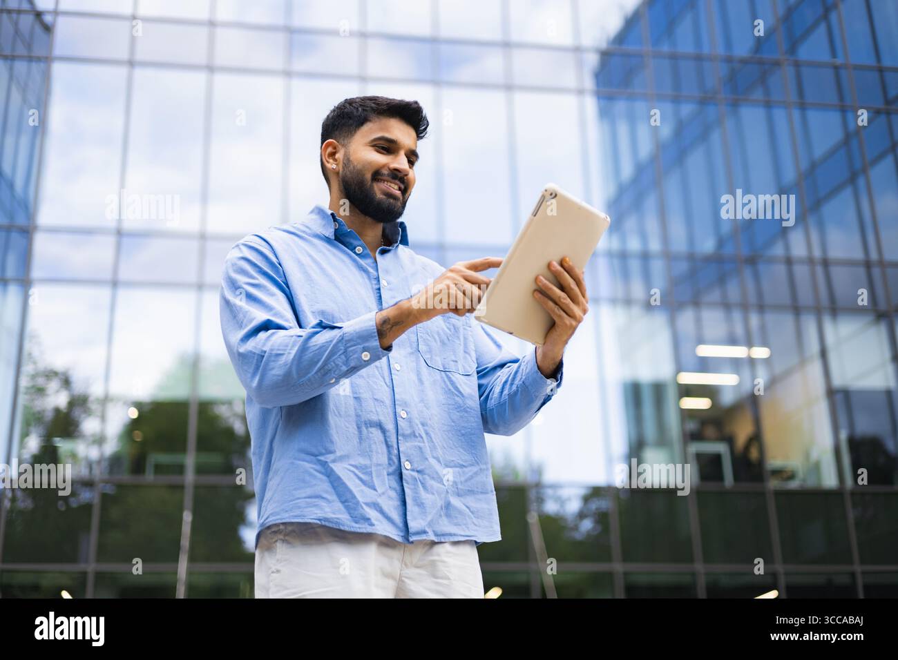 Bearded hispanic freelancer using hi-res stock photography and images ...