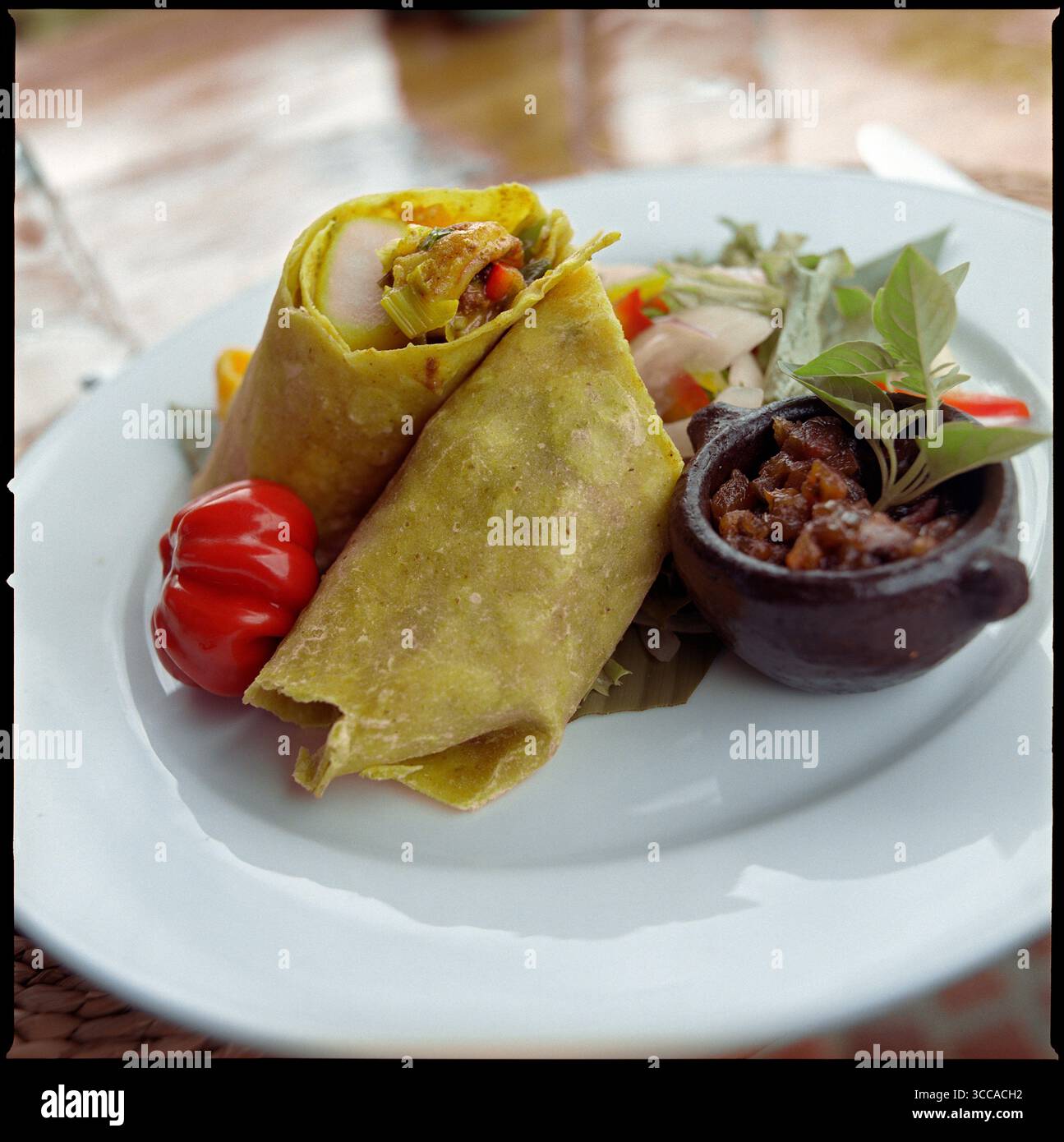 SOUFRIERE, ST. LUCIA - MARCH 2006: A specialty of the house at Dasheene ...