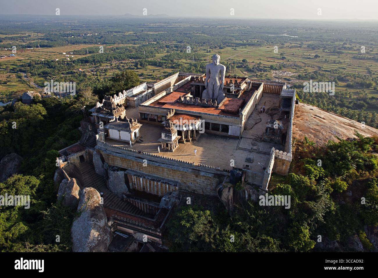 Aerial view of the Gommateshwara statue atop Vindhyagiri Hill, a ...