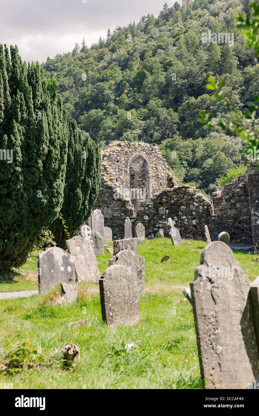 Medieval monastic ruins and graveyard at Glendalough, Ireland Stock ...