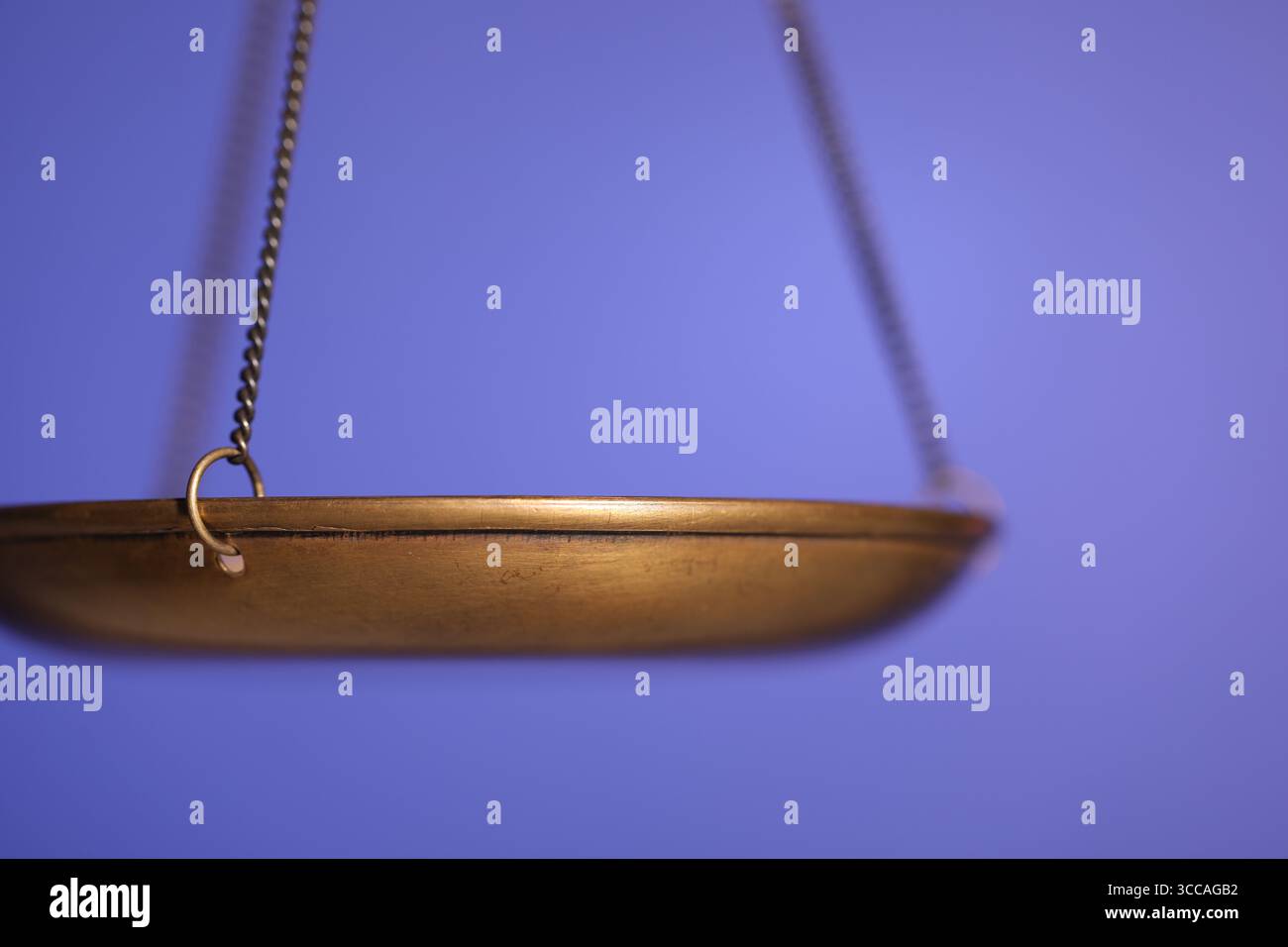 Scales of justice on violet background, closeup Stock Photo - Alamy