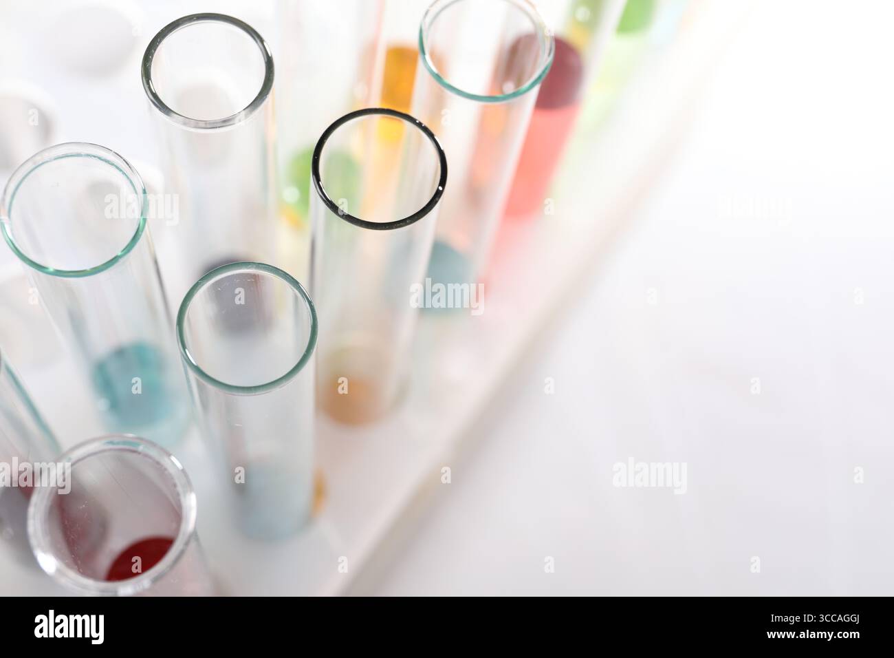 Solution chemistry. Test tubes with different samples on table, above ...