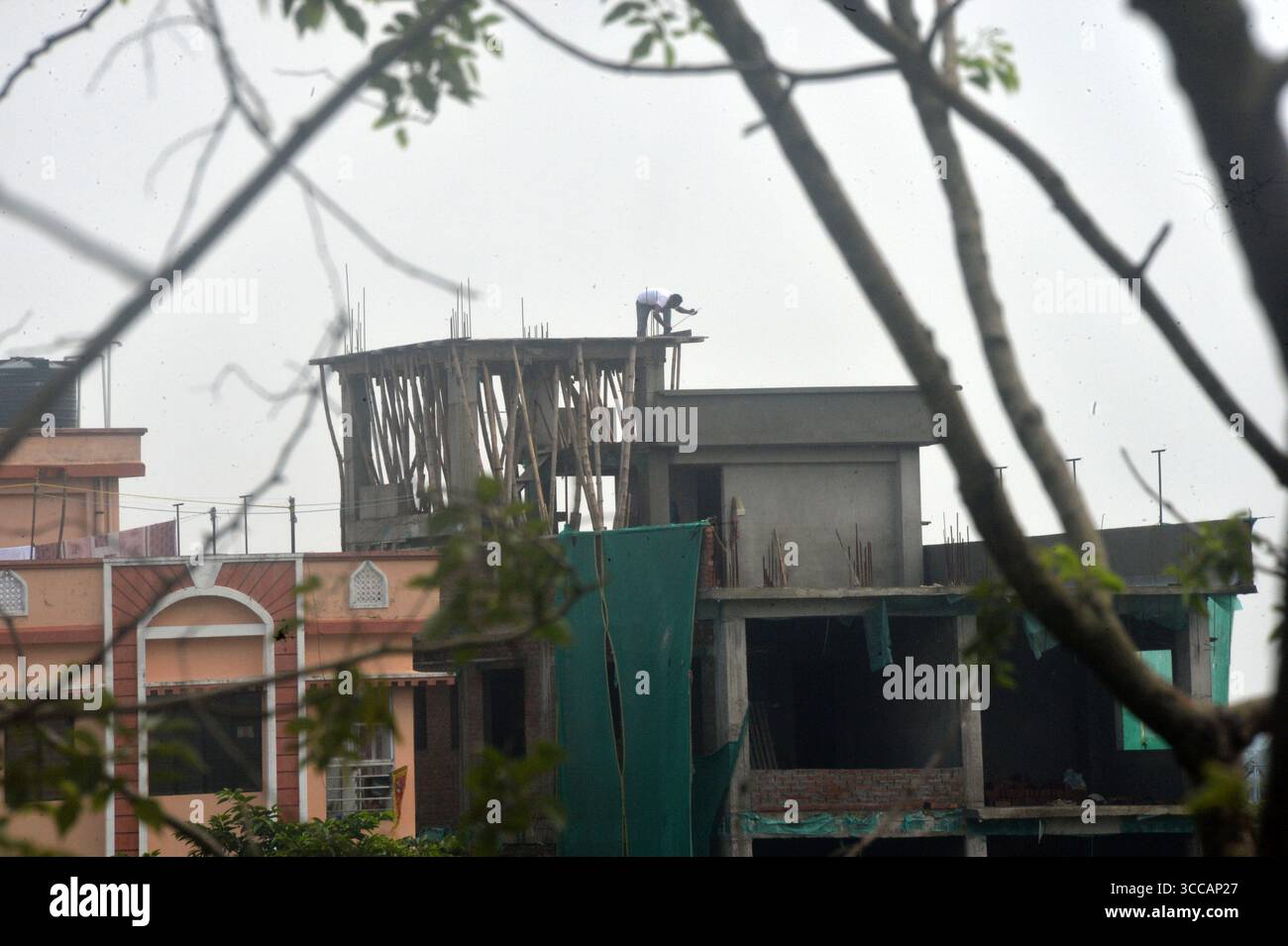 August 11, 2025, Siliguri, West Bengal, India: A Worker works at the ...
