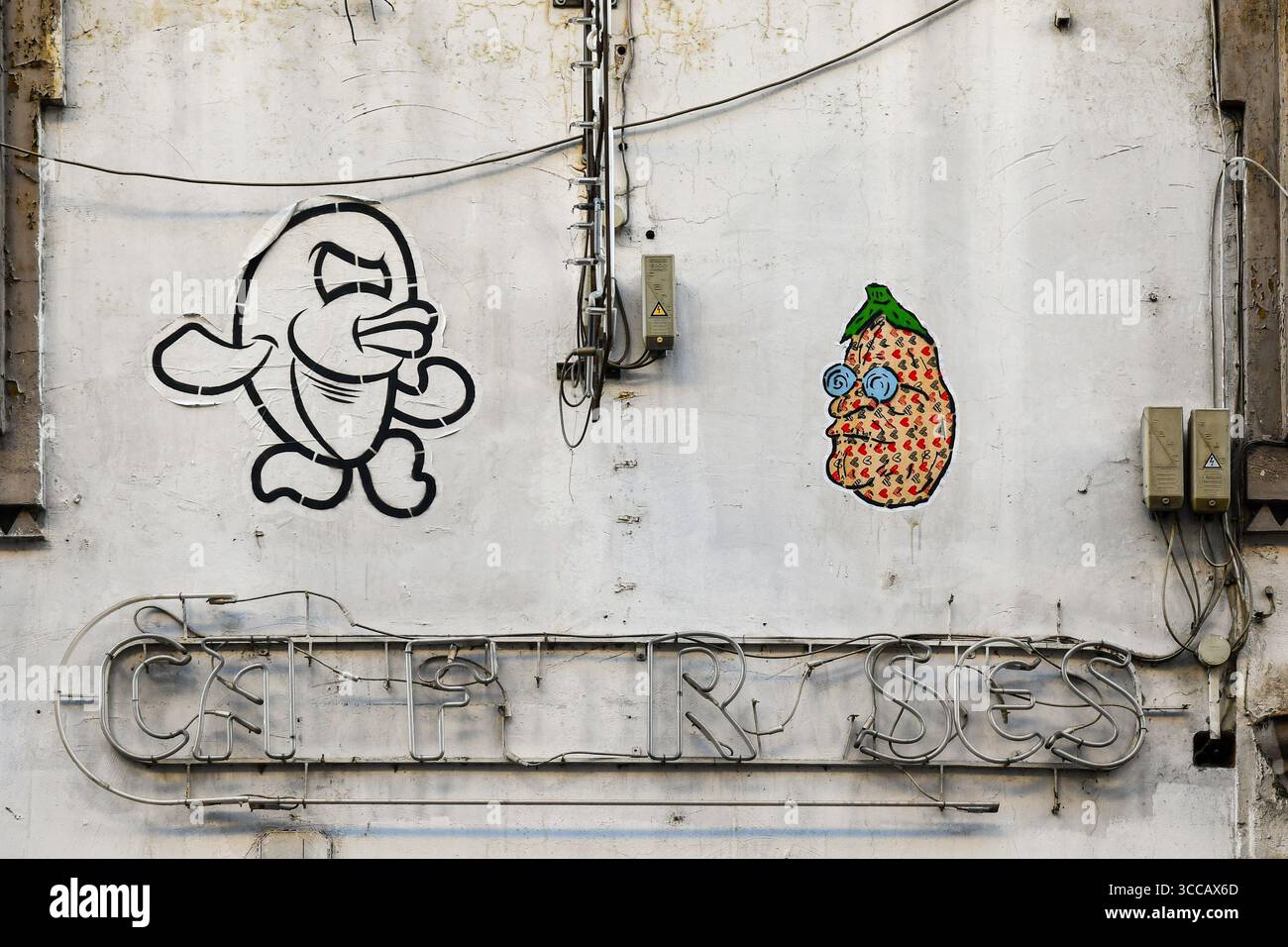 "Fishes Invasion" street art by Merioone (left) next to "Melanziana" by ...