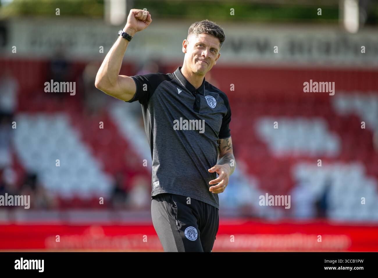 Football manager Alex Revell celebrating win whilst first team coach at ...
