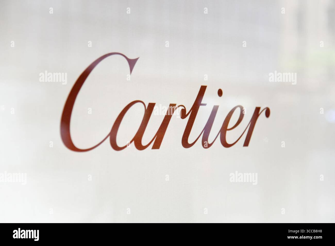 Cartier brand signage is displayed in New York, NY, August 10, 2025 ...