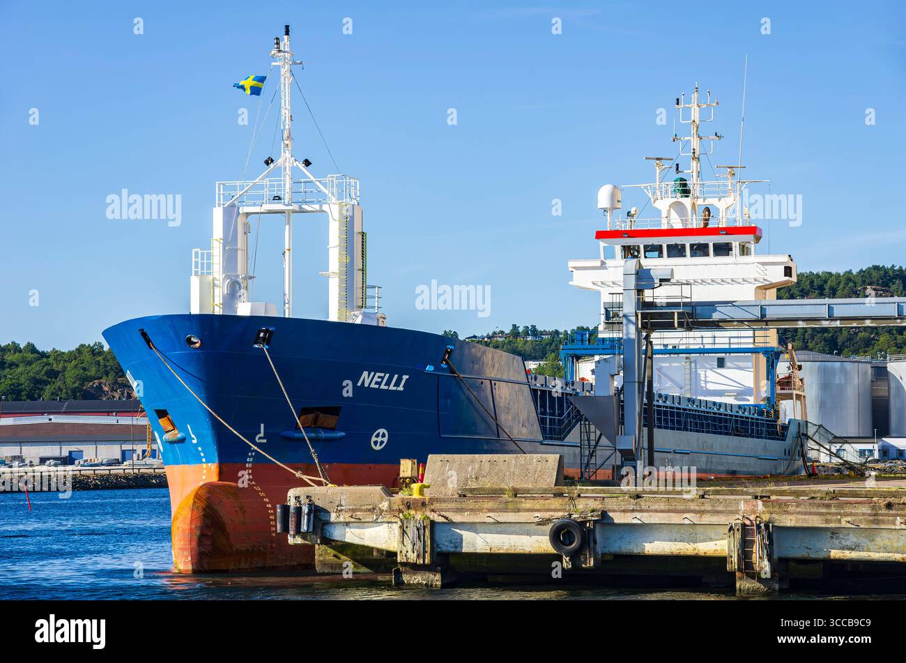 Industrial harbour structures and cargo ship NELLI in the harbour of ...