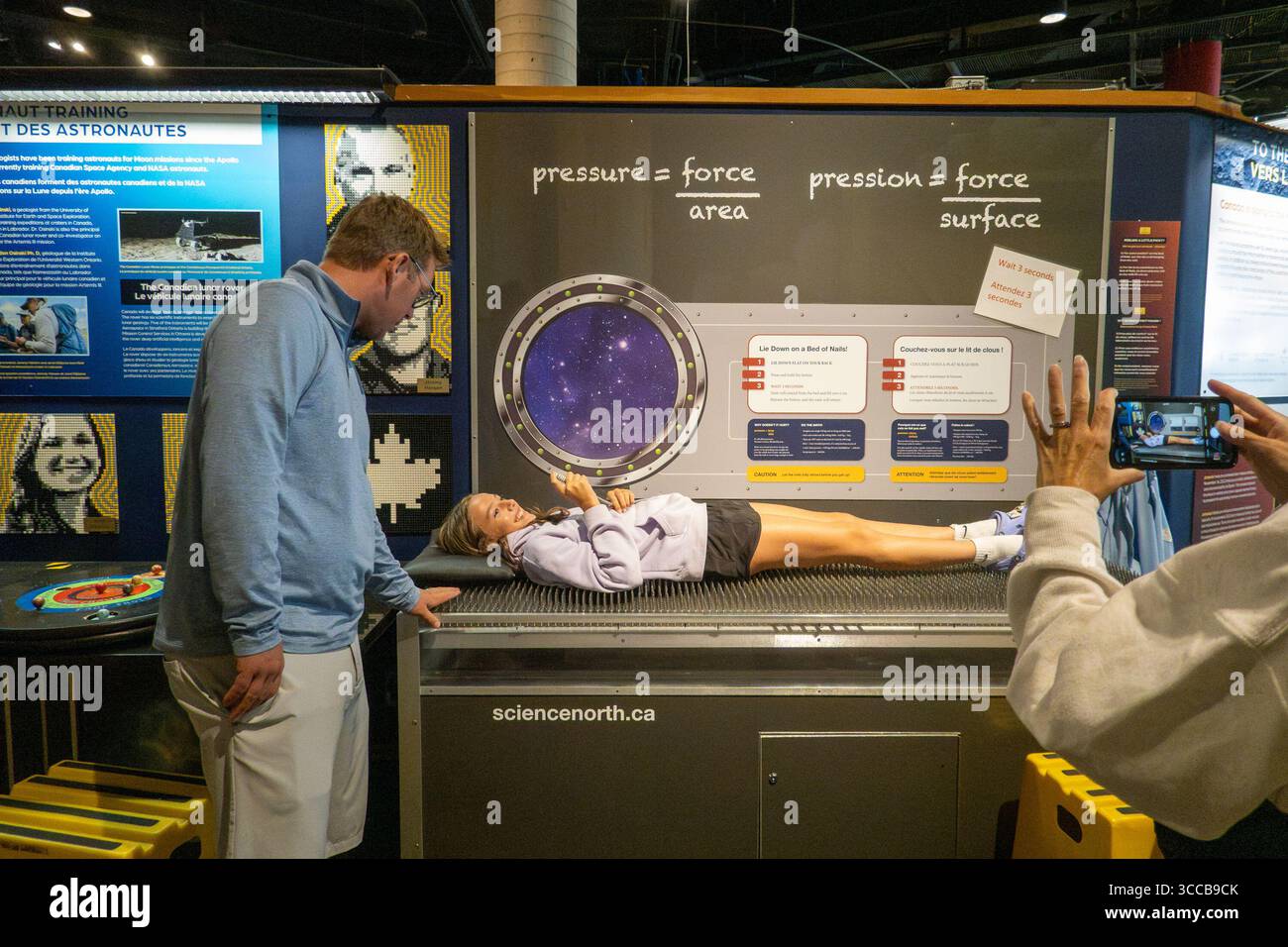 Visitors to Science North enjoy an interactive display. Science North ...