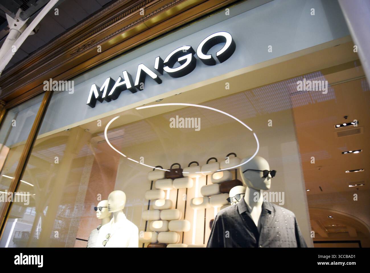 Punto Fa S.L., Mango brand signage is displayed in New York, NY, August ...