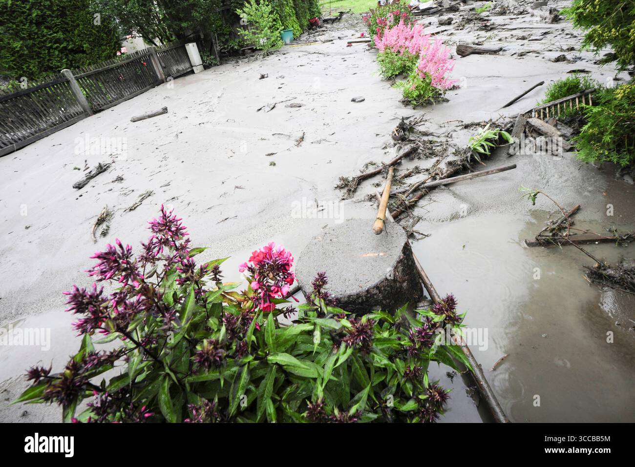 storm damage caused by mudslides, debris and mud after heavy rainfalls ...