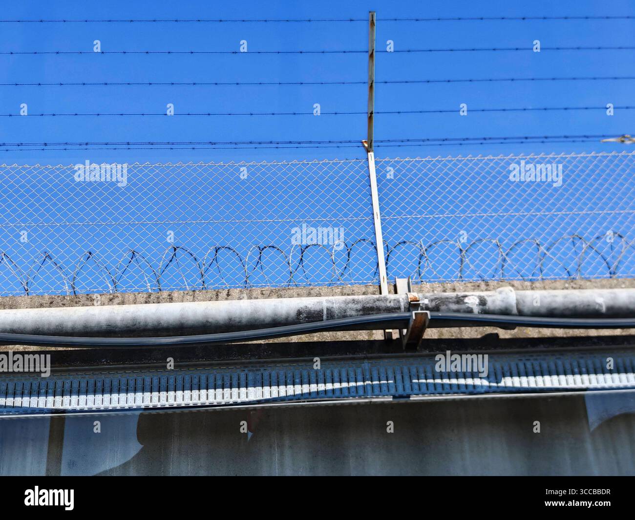 barbed wire as barrier in a prison, measure to prevent outbreaks barbed ...