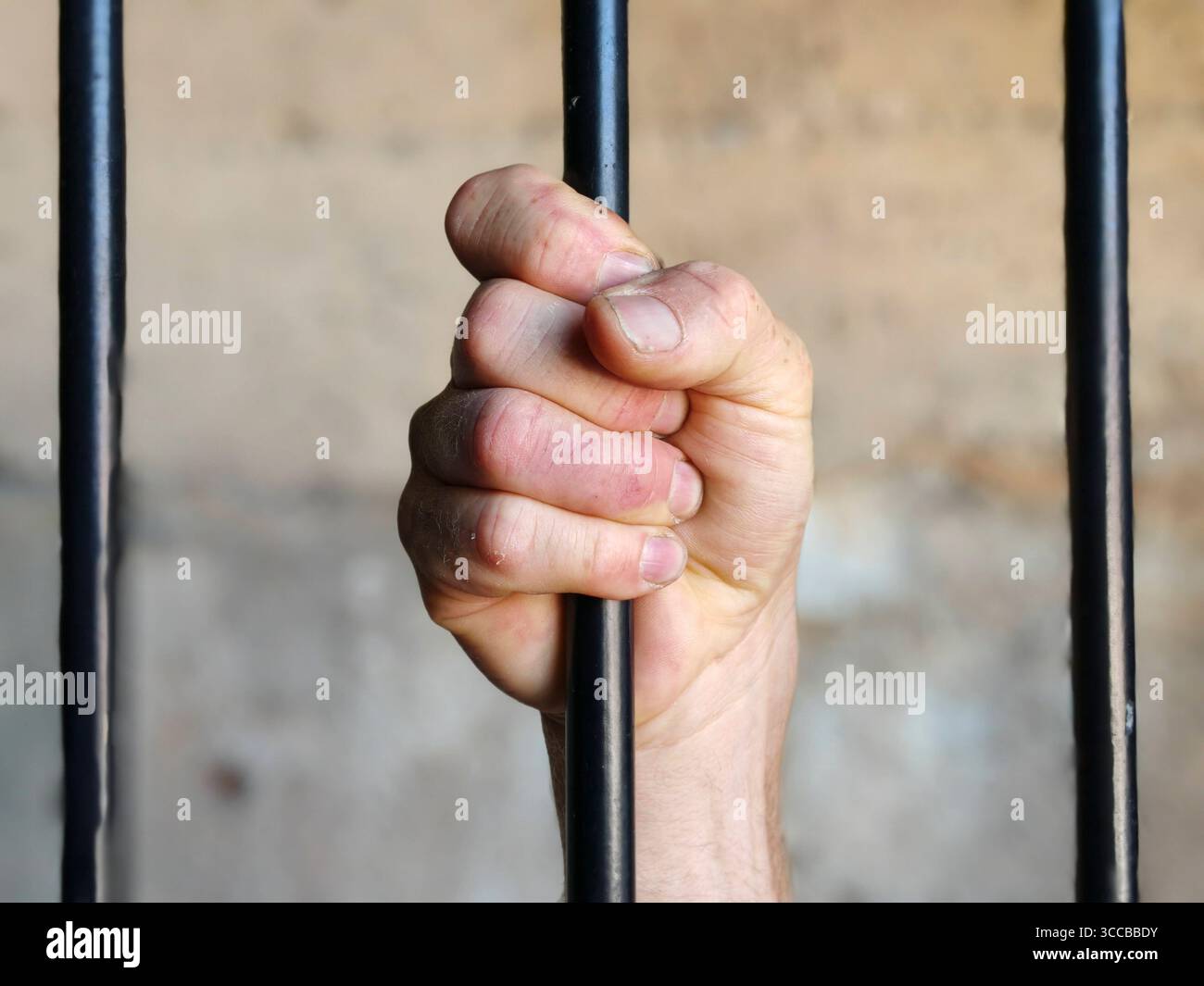 prisoner looking out of the window of a prison cell prisoner at the ...