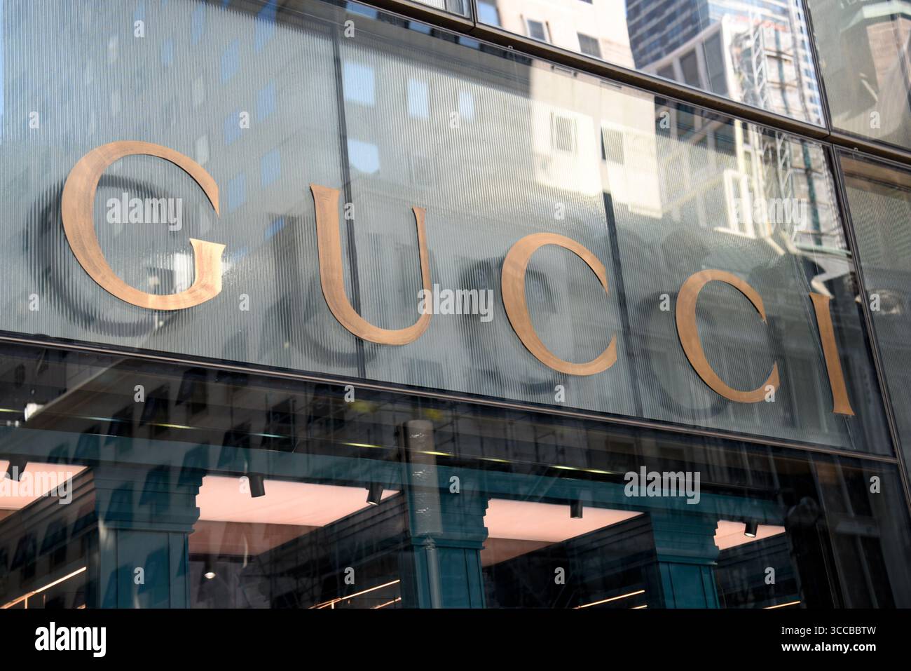 Guccio Gucci S.p.A., Gucci brand signage is displayed in New York, NY ...