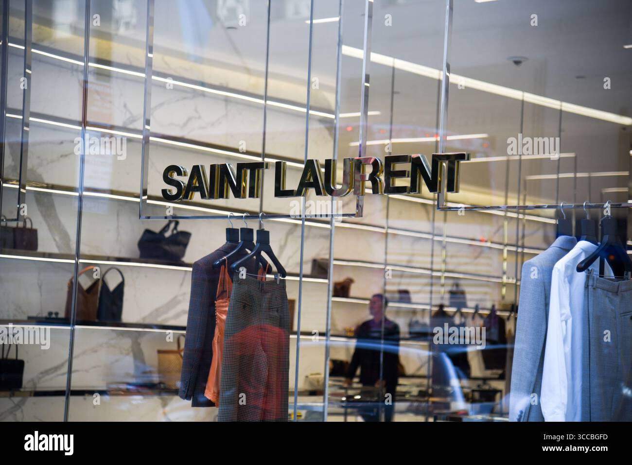Yves Saint Laurent SAS, Saint Laurent brand signage is displayed in New ...