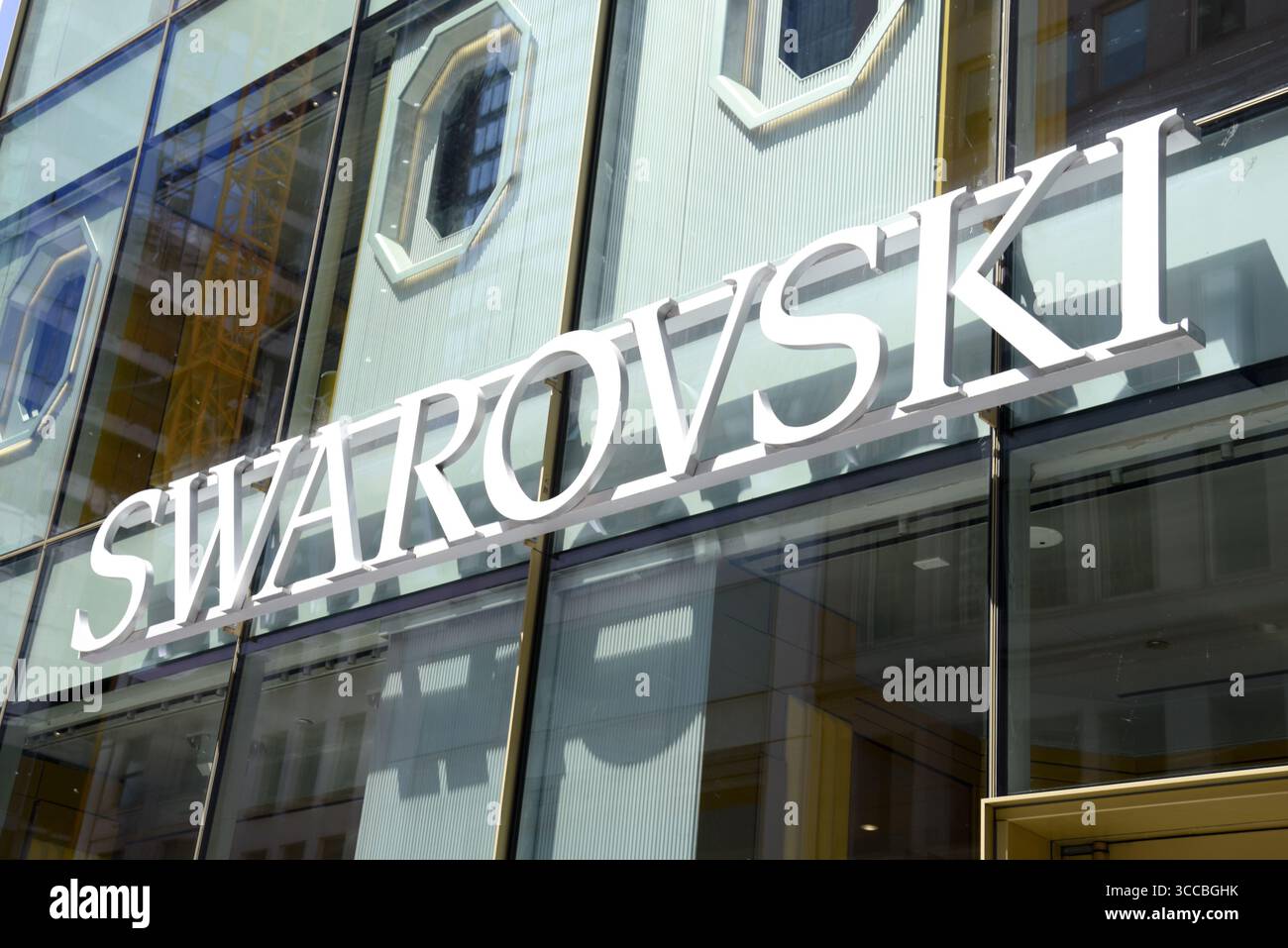 Swarovski brand signage is displayed in New York, NY, August 10, 2025 ...