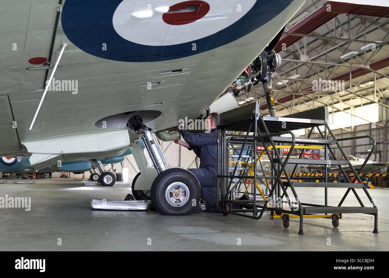 Battle of Britain Memorial Flight engineers work on Supermarine ...