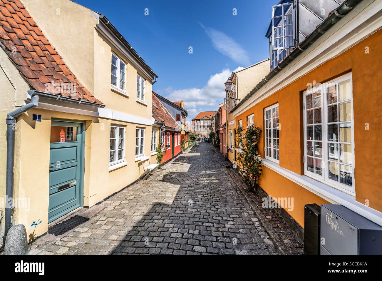 A picturesque street in a historic village showcases vibrant ...