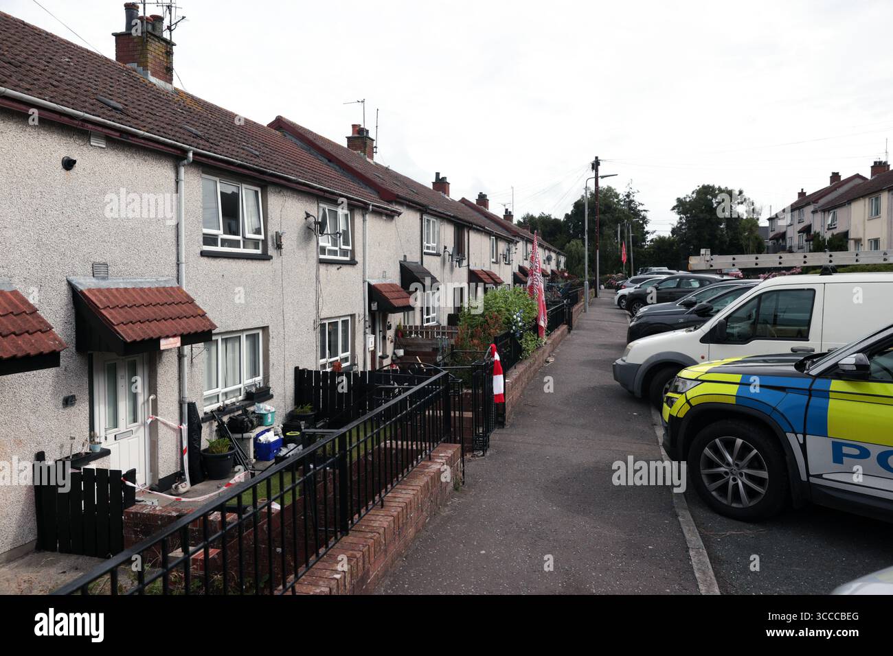 A police van at the scene in the Marian Park area of Downpatrick, Co ...