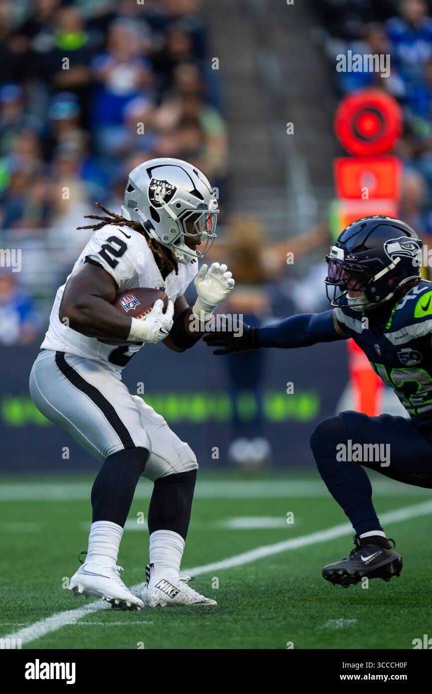 Las Vegas Raiders running back Ashton Jeanty (2) rushes with the ball ...