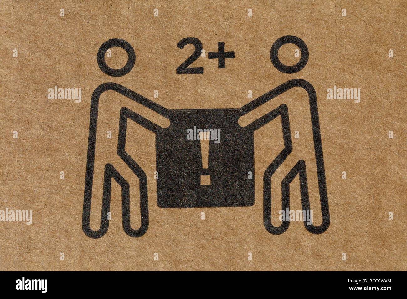 2 Person Lift symbol - detail on cardboard packaging Stock Photo - Alamy