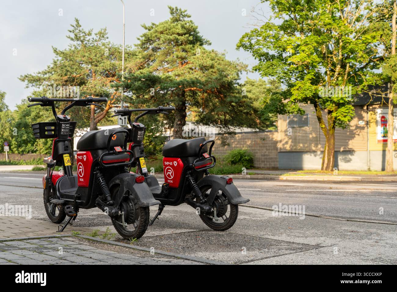 August 4, 2025, Tallinn, Estonia: Red Ride electric mopeds parked on ...