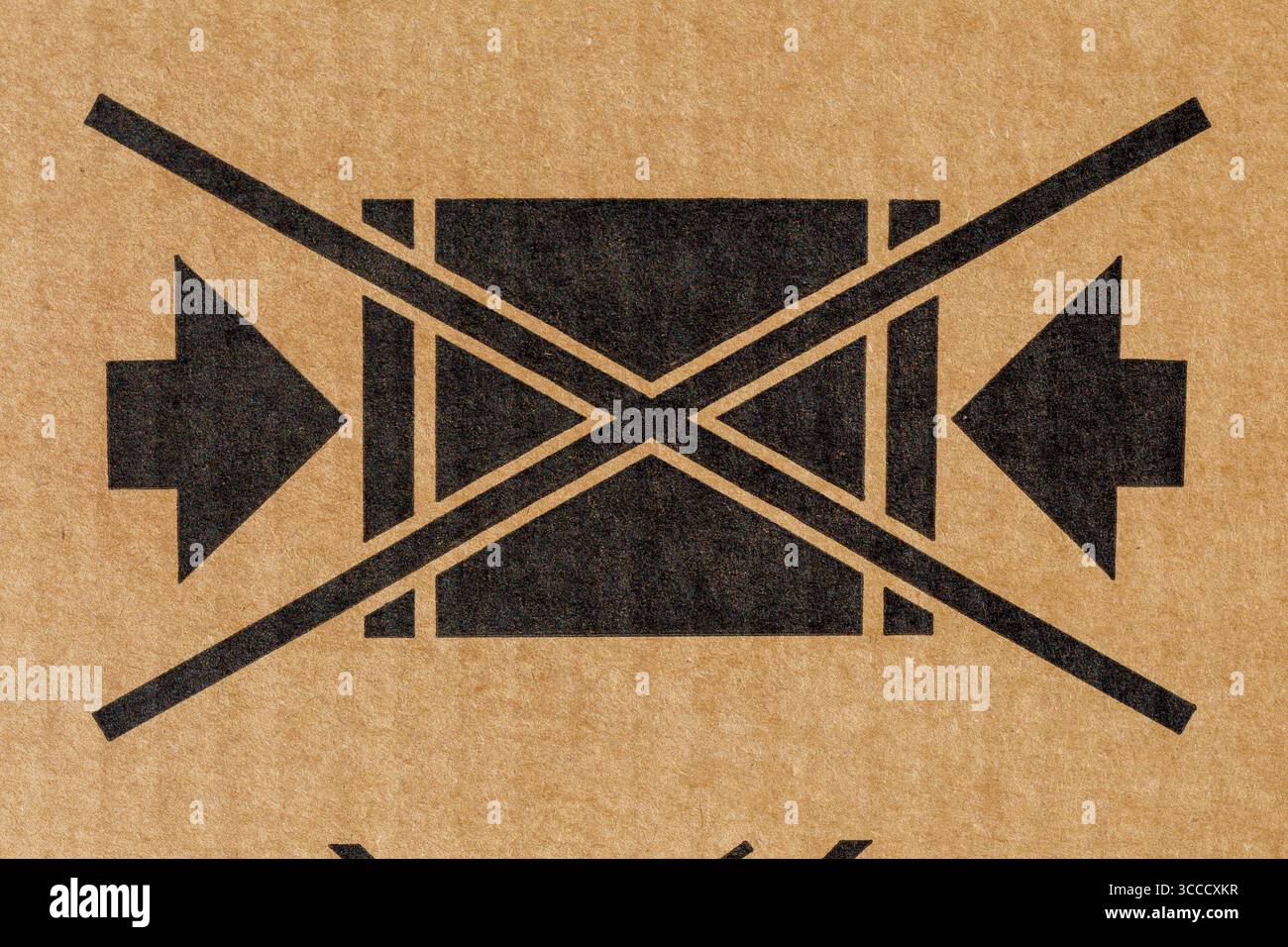 symbols - detail on cardboard packaging Stock Photo - Alamy