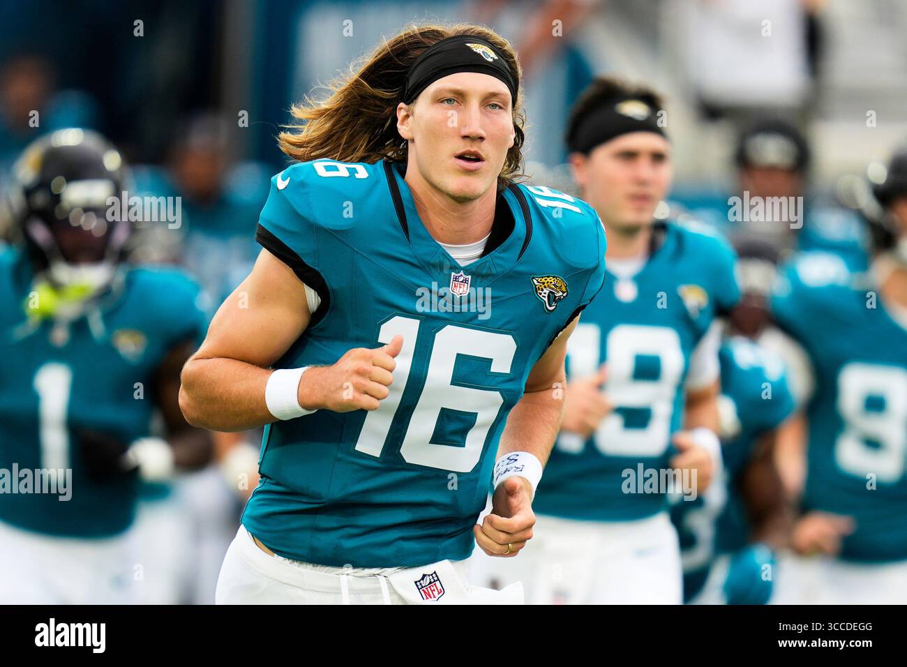 Jacksonville Jaguars quarterback Trevor Lawrence (16) takes the field ...