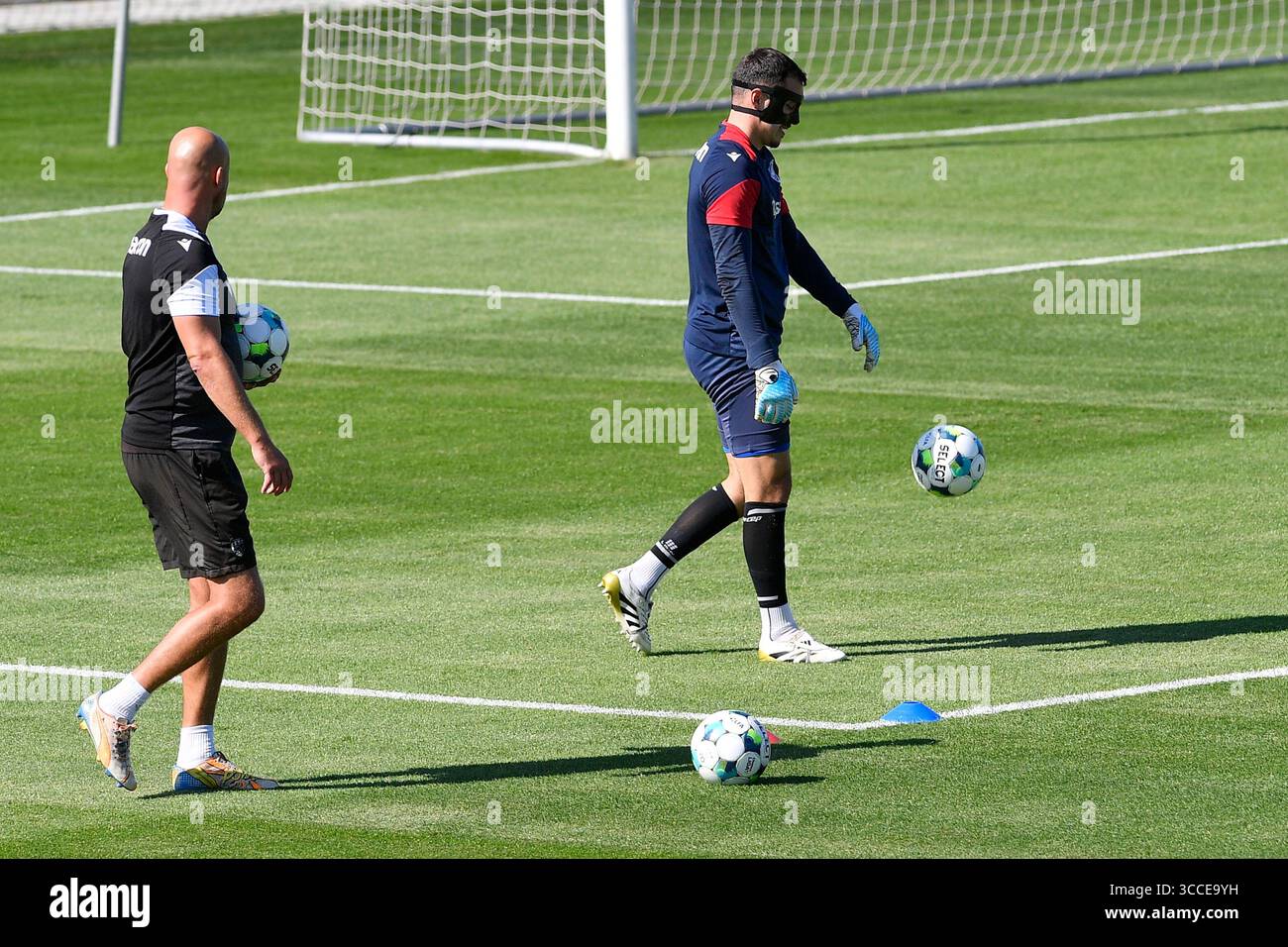 Goalkeeper Martin Jedlicka (right) attends a Plzen players training ...