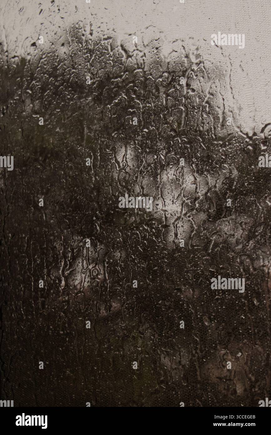 Droplets on glass night closeup hi-res stock photography and images - Alamy