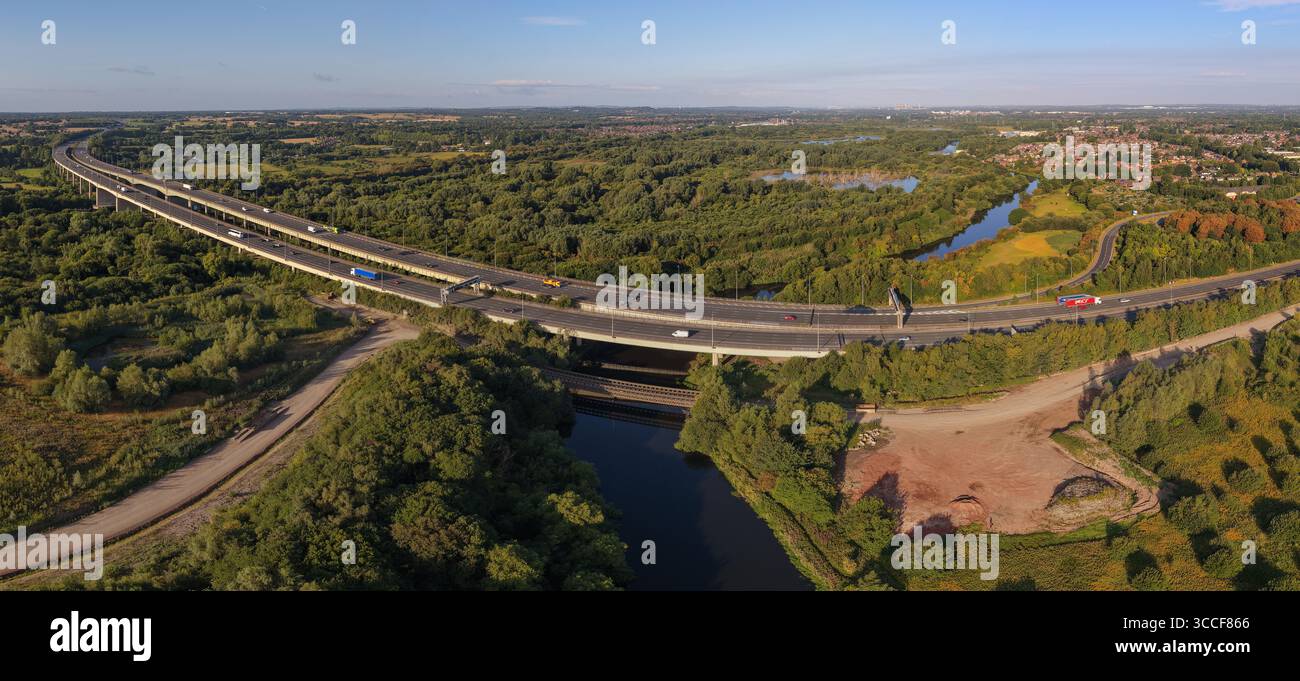 Aerial image of the M6 motorway on Thelwall Viaduct crossing the River ...