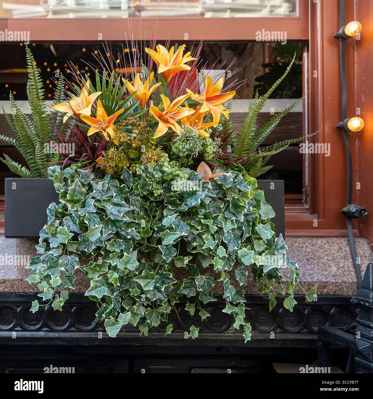 Vibrant Sunflower and Marigold Window Box Display Stock Photo - Alamy
