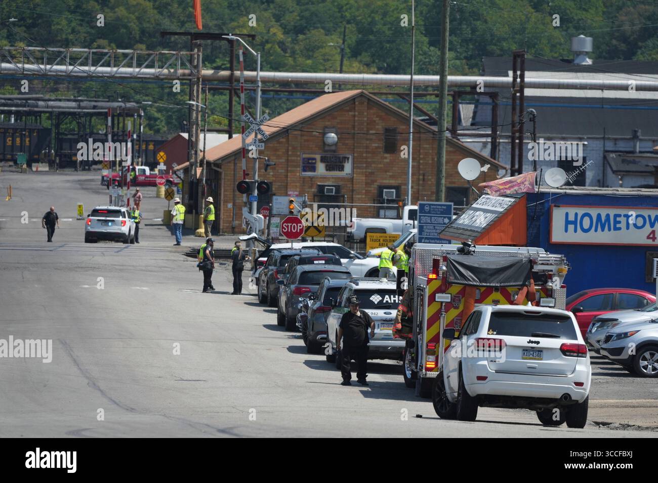 Emergency crew gather after an explosion at the Clairton Coke Works, a ...