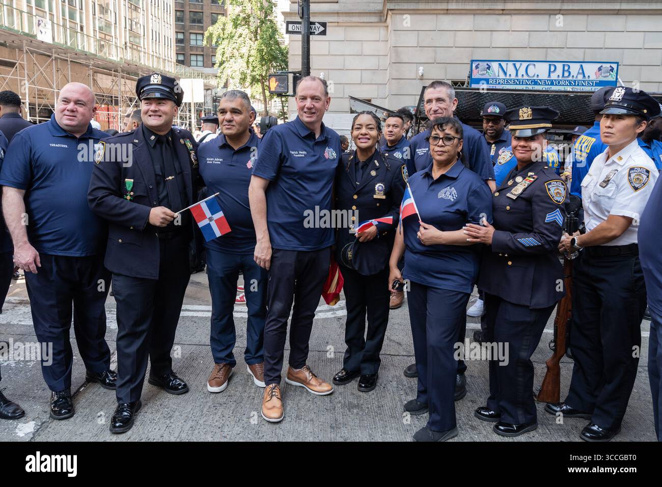 NYPD police officers and President of PBA Patrick Hendry participate in ...