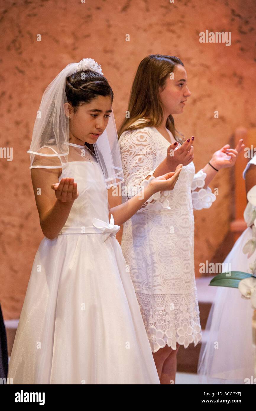 May 8, 2016: Formally dressed Hispanic and Caucasian children sing a ...