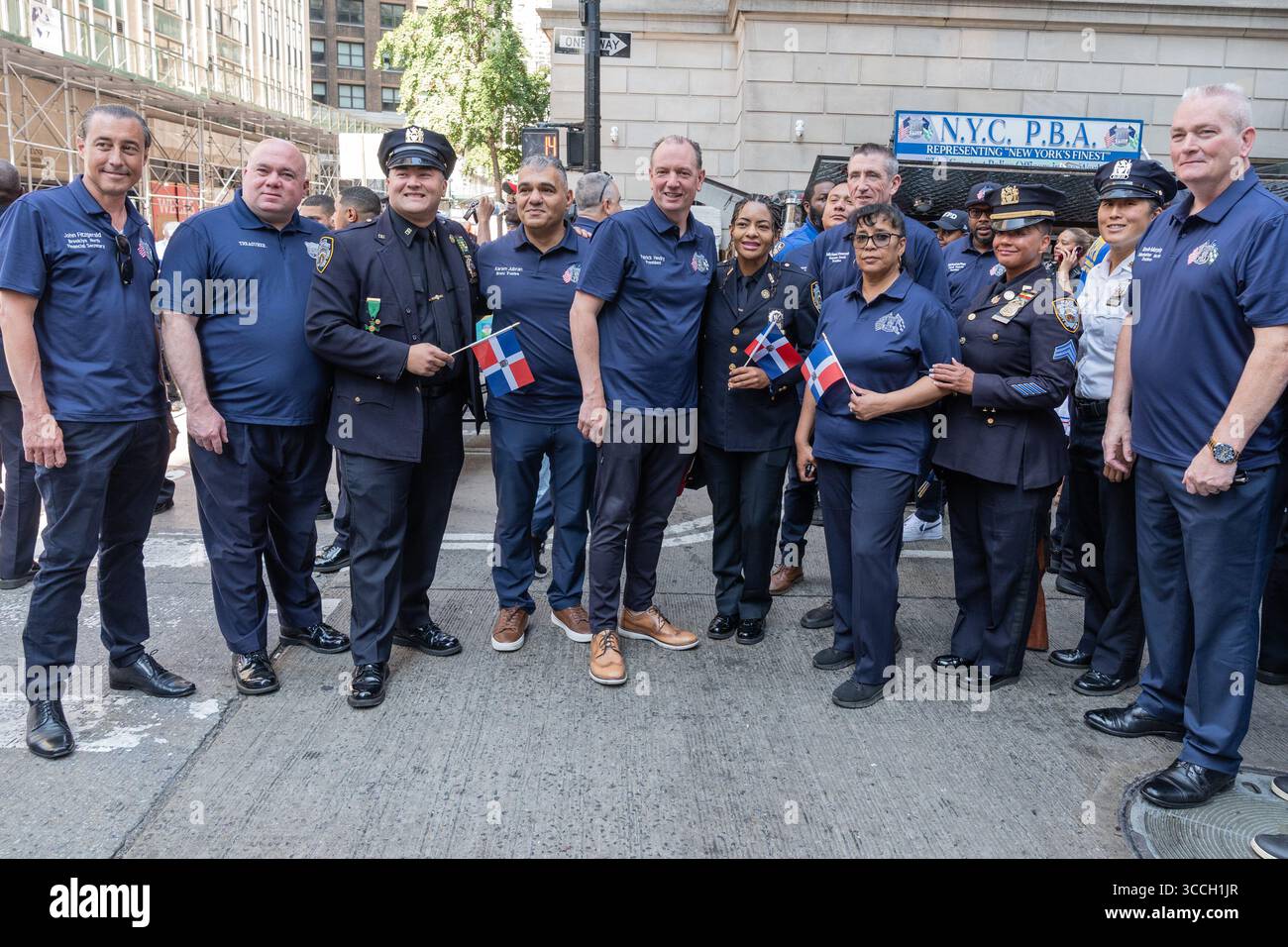 NYPD police officers and President of PBA Patrick Hendry participate in ...