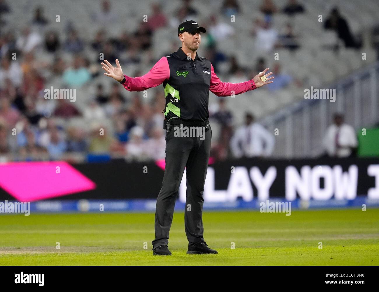 Umpire Michael Gough signals for a wide during the Hundred Men's match ...