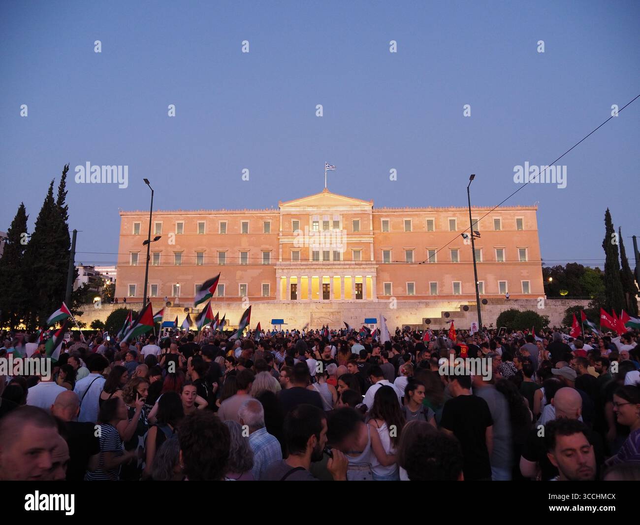 Athens, Greece - August 10 2025: Large crowd gathered in front of the ...