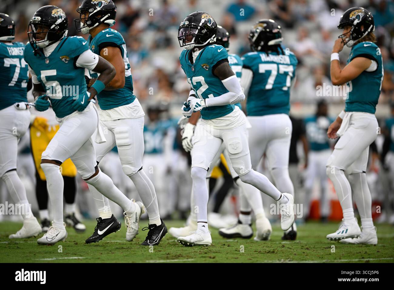 Jacksonville Jaguars wide receiver Travis Hunter (12) breaks from a ...
