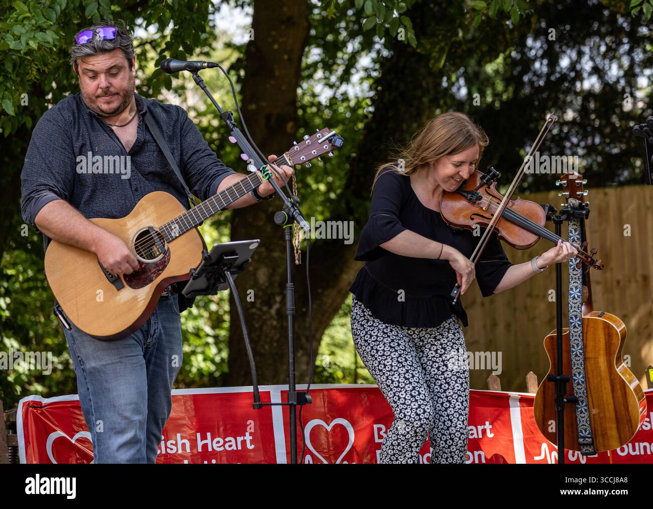 Outdoor live music performance with the band Splat The Rat at The Dumb ...