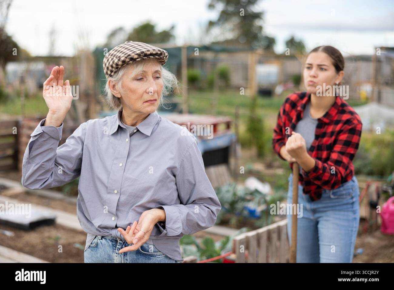 Conflict between female neighbors in country farm Stock Photo - Alamy