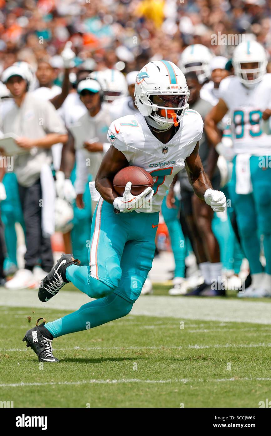 Miami Dolphins wide receiver Tahj Washington (7) runs with the ball ...