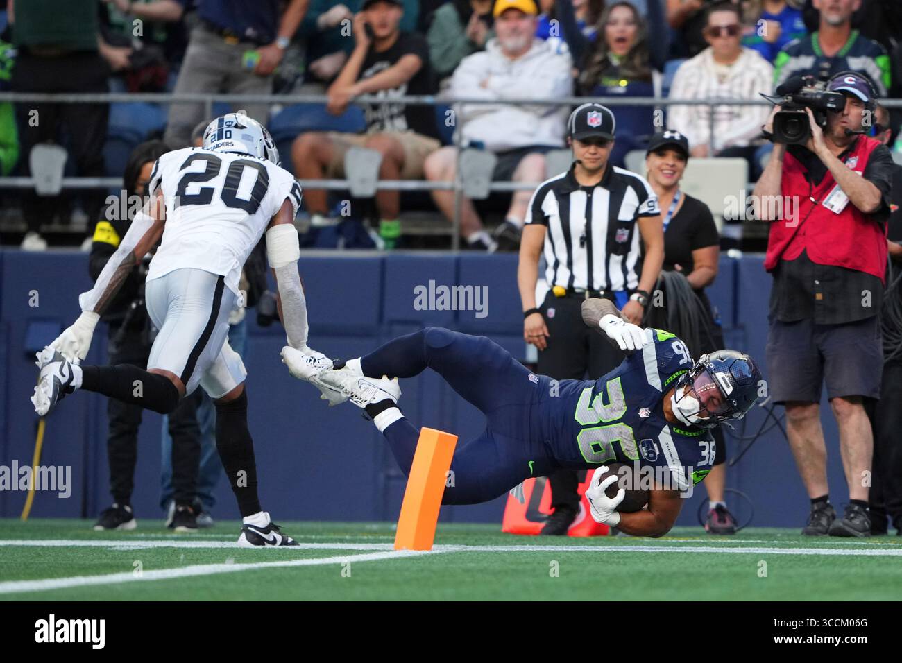 Seattle Seahawks running back George Holani scores a touchdown against ...