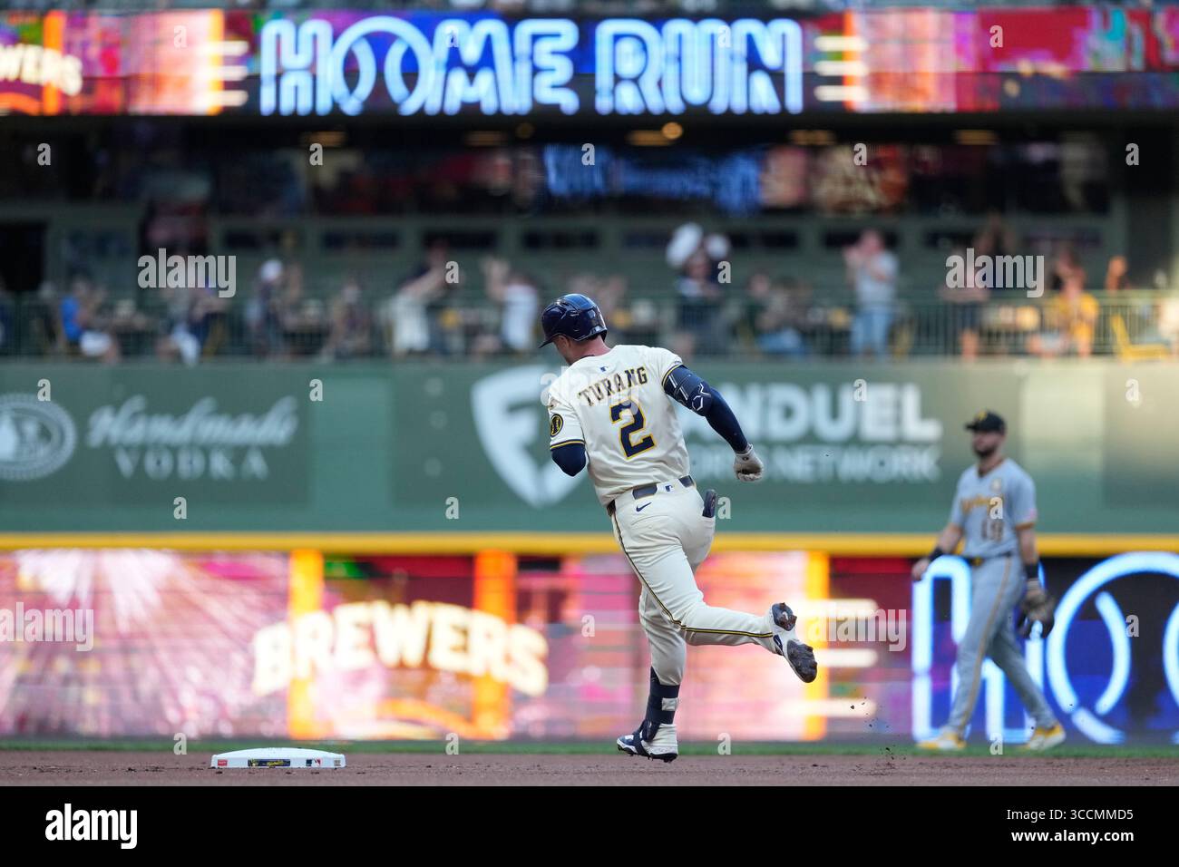 Milwaukee Brewers' Brice Turang rounds the bases after hitting a solo ...