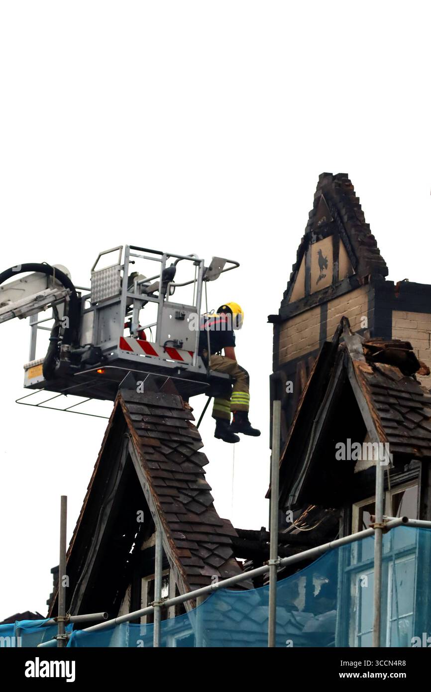 Firefighter battling major raven Hotel fire in Droitwich Stock Photo ...