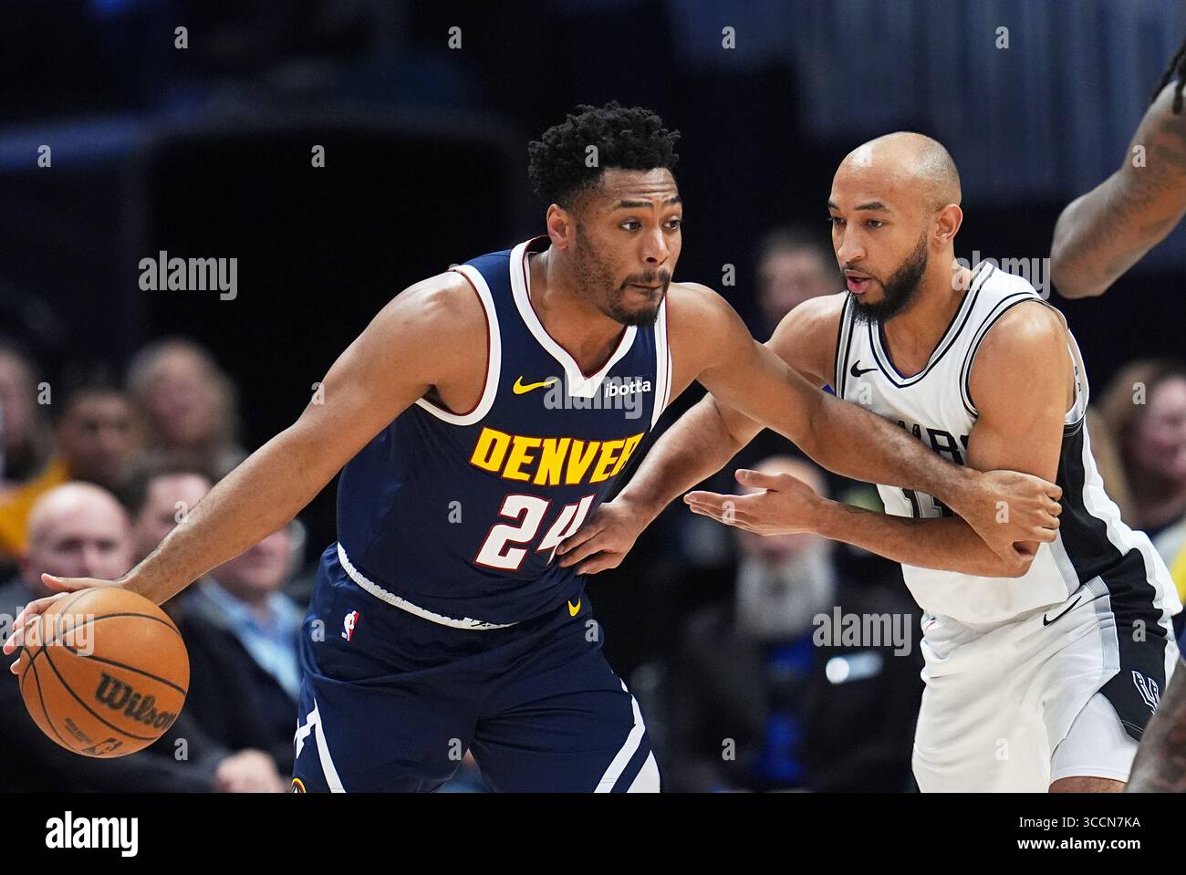 Denver Nuggets guard Jalen Pickett (24) and San Antonio Spurs guard ...