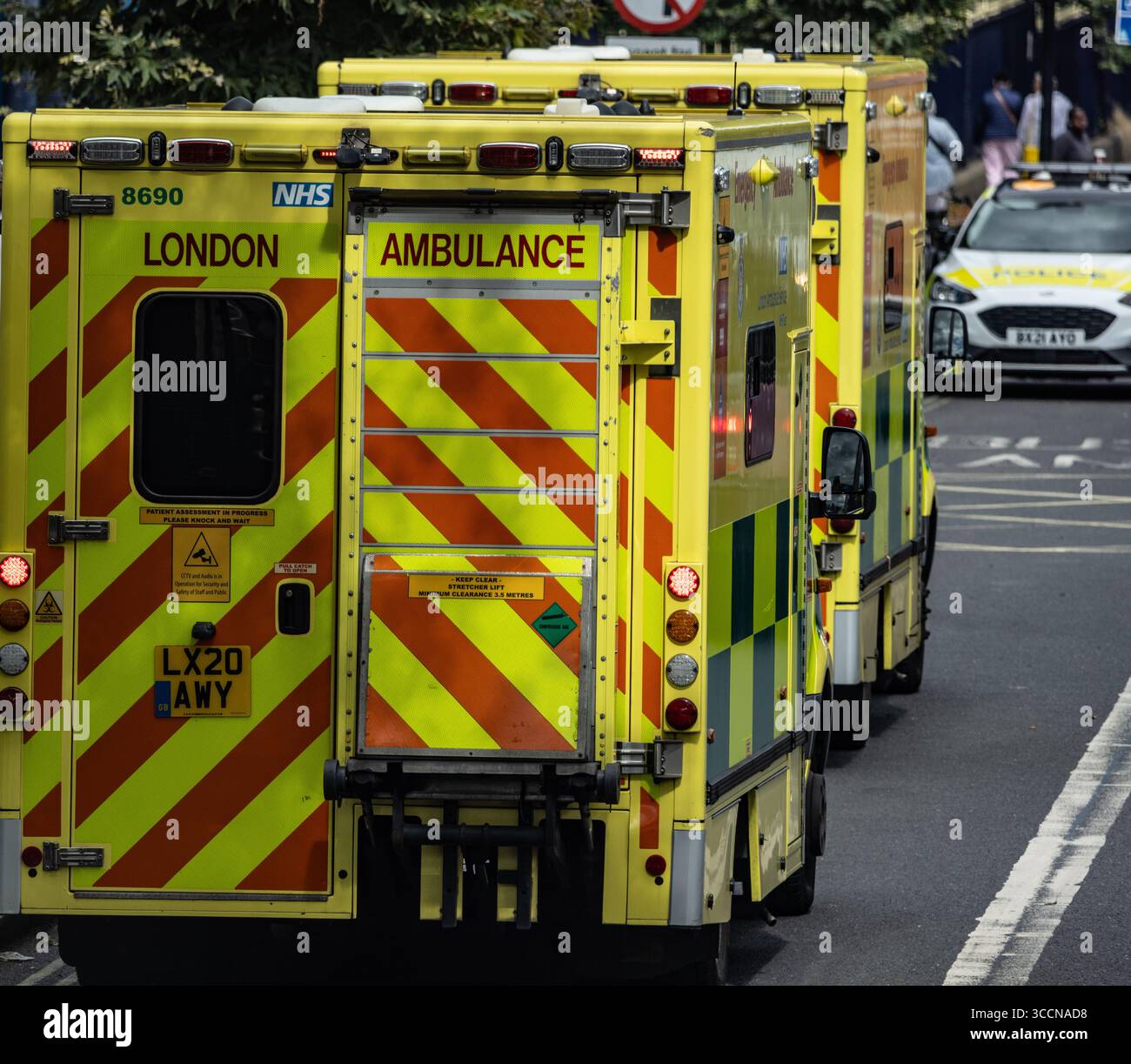 LONDON, UK - AUGUST 5, 2025 - Row of NHS ambulances attending an ...